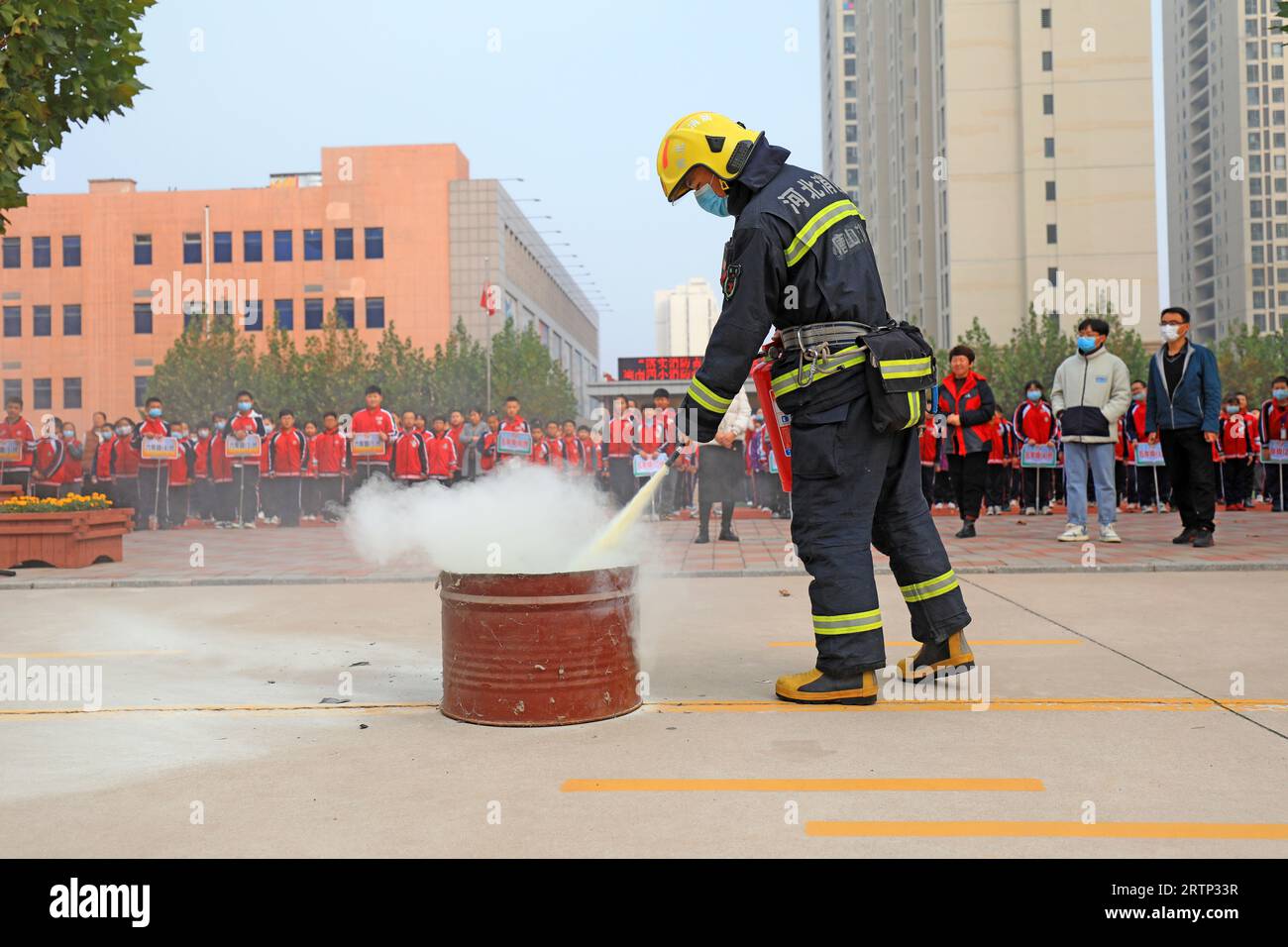 LUANNAN COUNTY, China - November 3, 2021: Firefighters demonstrate the ...