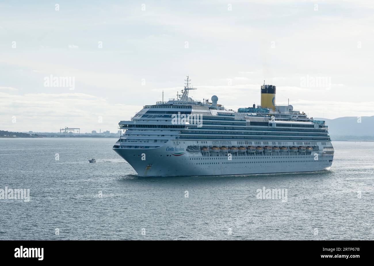 The Costa Favolosa cruise ship leaving Belfast in Northern Ireland UK ...