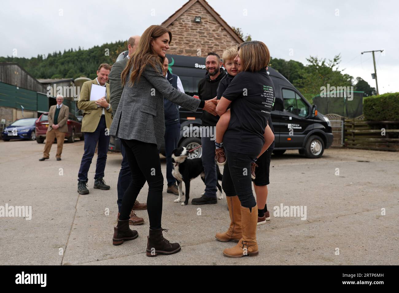 The Prince and Princess of Wales are greeted by Sam Stables, George ...