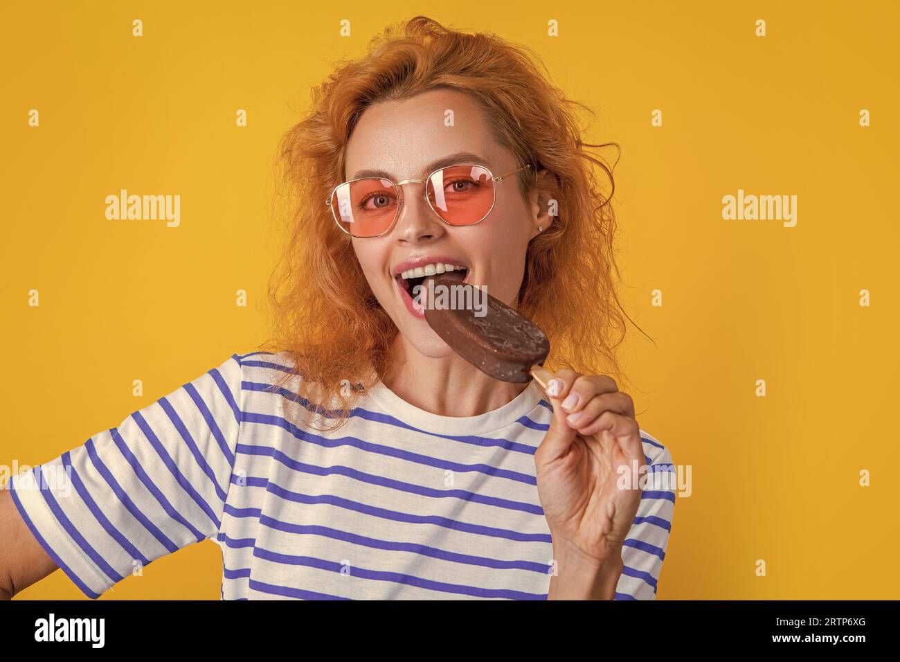 photo of girl eat icelolly ice cream at summer. girl with icelolly ice ...