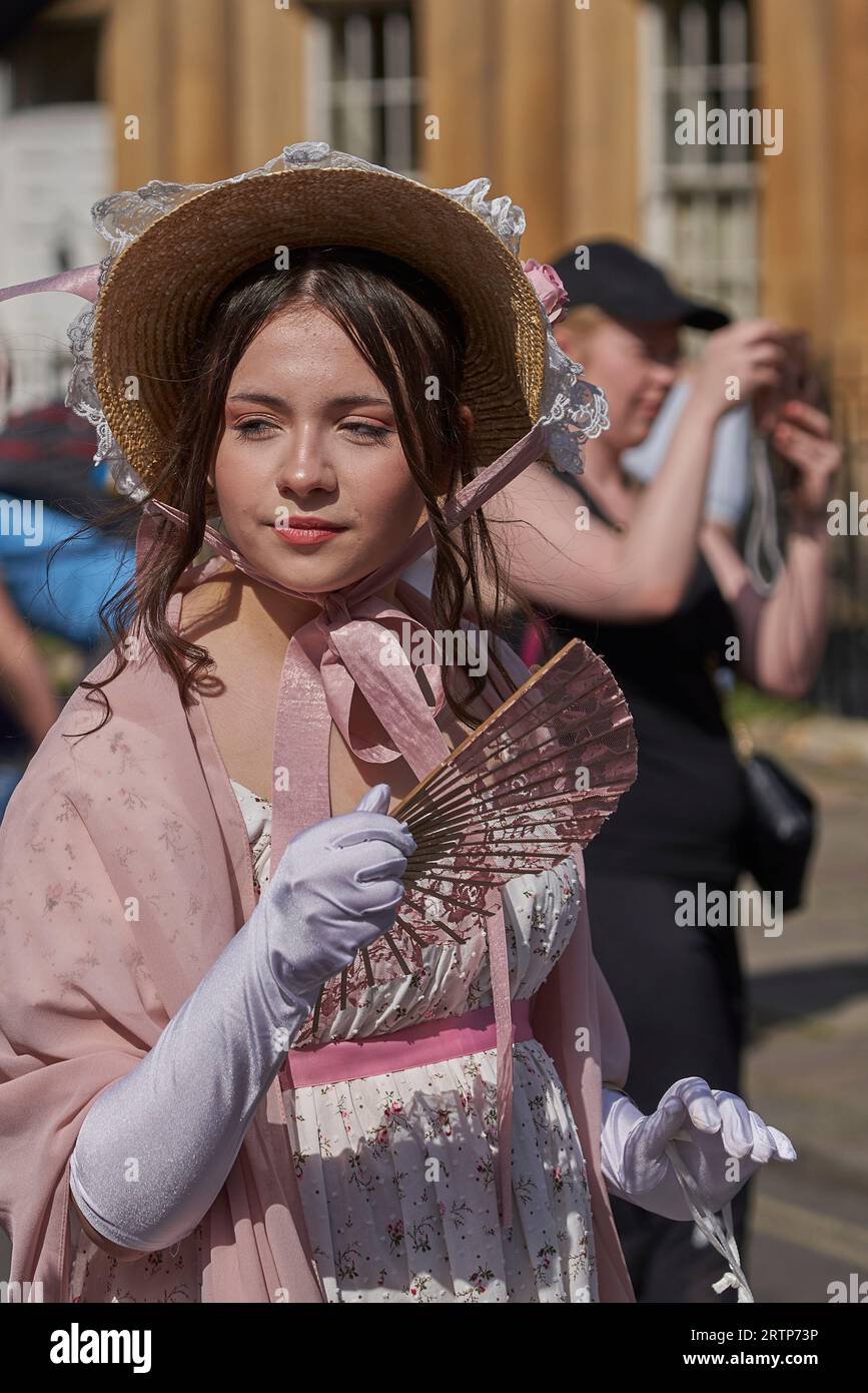 Parade of people dressed in period costume from the Georgian era as ...