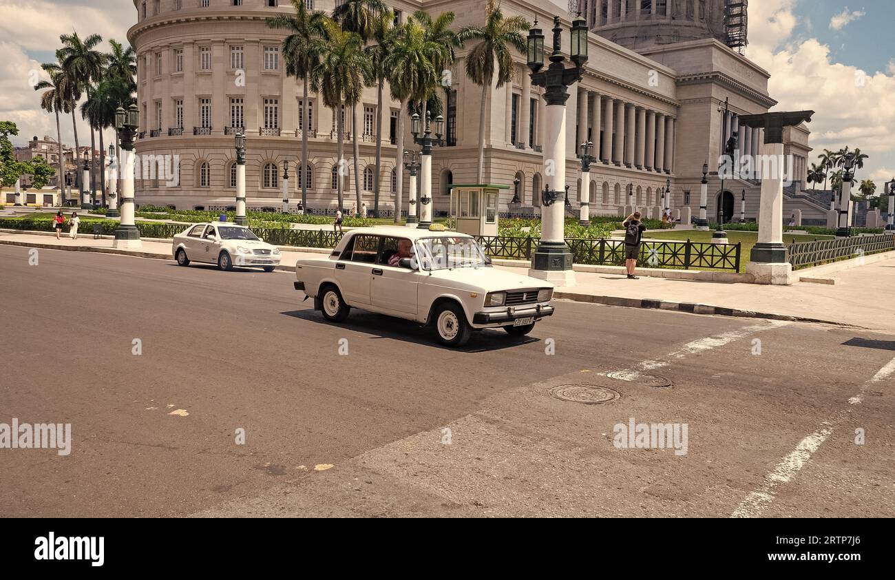Havana, Cuba - May 02, 2019: National Capitol Building with moskvitch ...