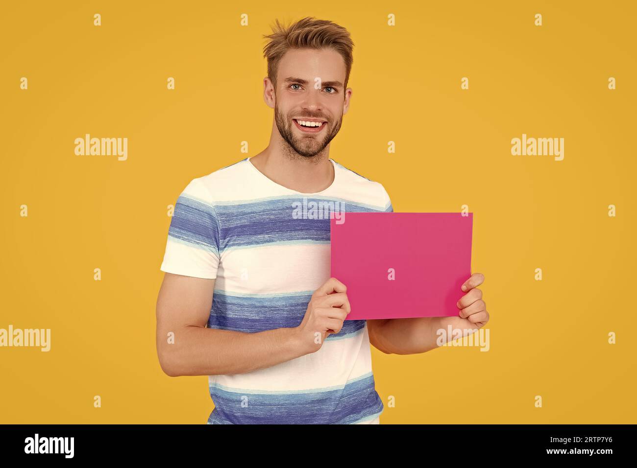 positive man offer his product advertisement. man holds paper with ...