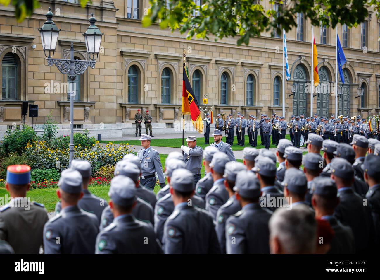 Munich, Germany. 14th Sep, 2023. Soldiers carry the German flag along ...