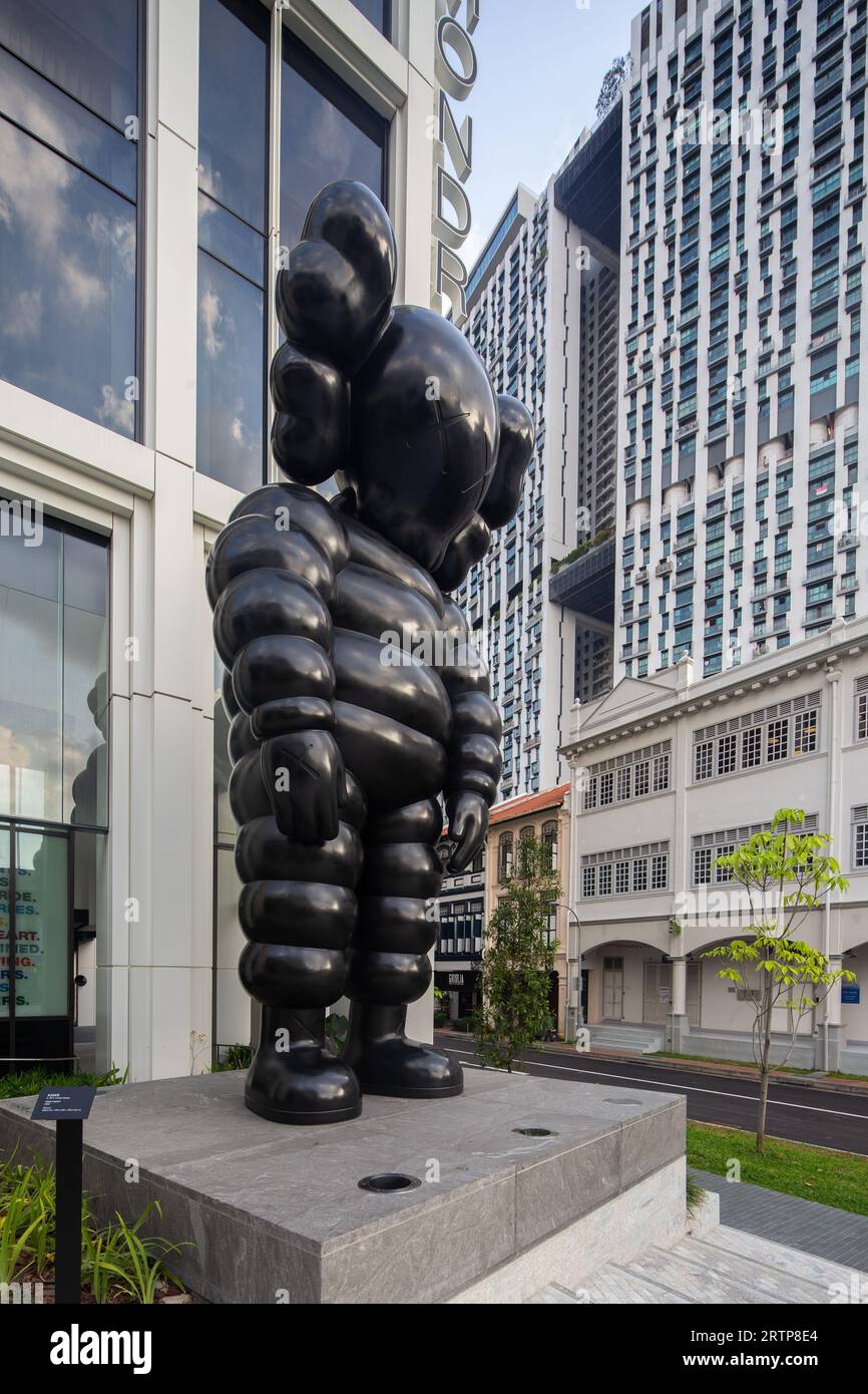 KAWS sculpture, What Party, stands tall in Duxton area, Singapore Stock ...