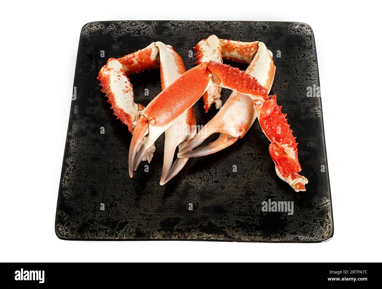king crab leg in front of white background Stock Photo - Alamy