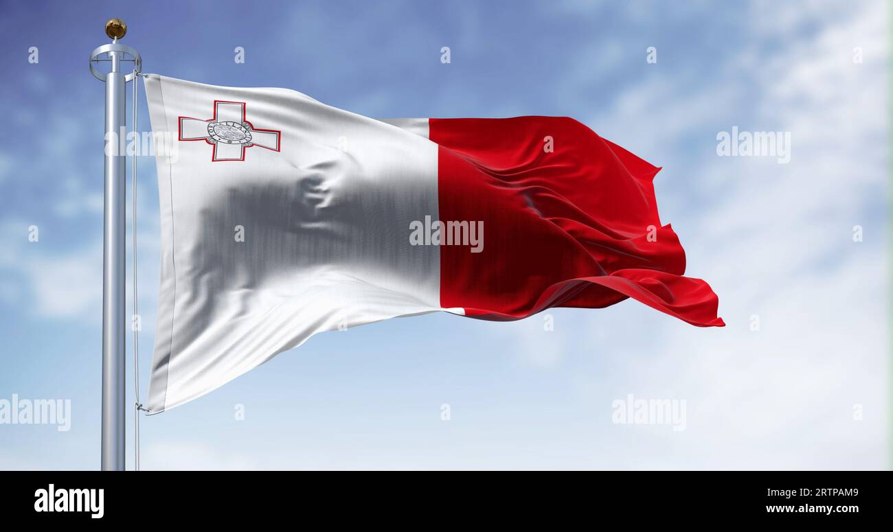 Malta national flag waving in the wind on a clear day. White and red ...