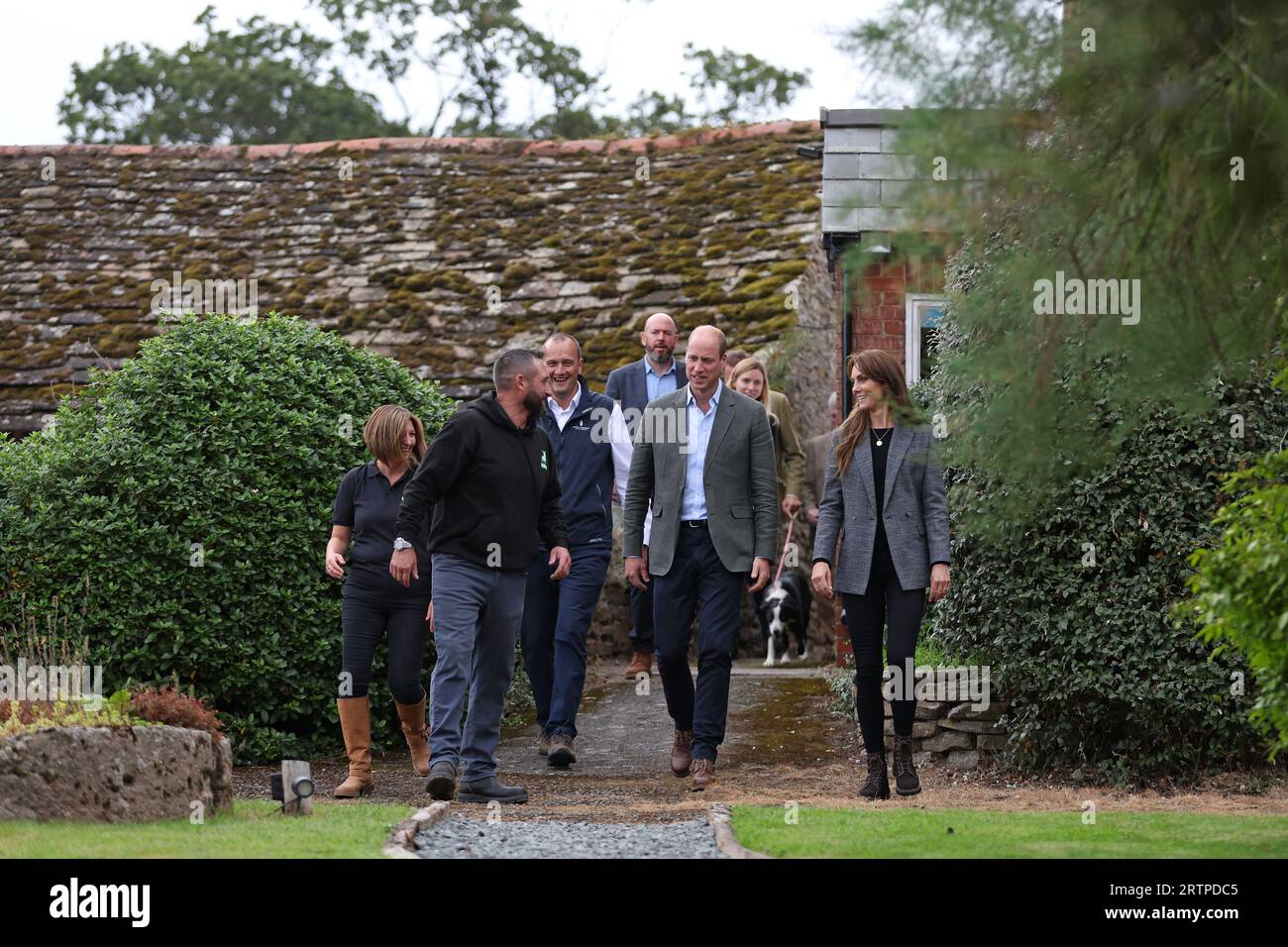 The Prince and Princess of Wales talk to Emily Stables (left) and Sam ...