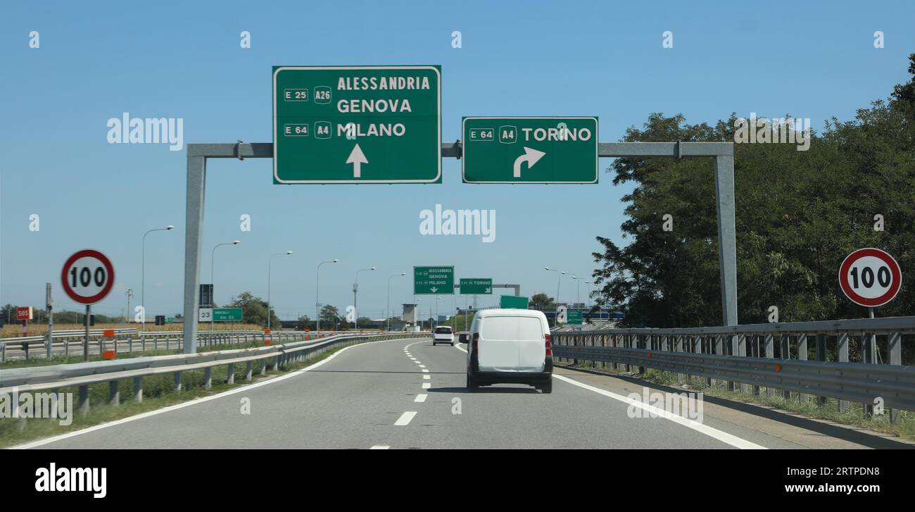 Road sign on the highway with the Italian places such as Milan Turin ...
