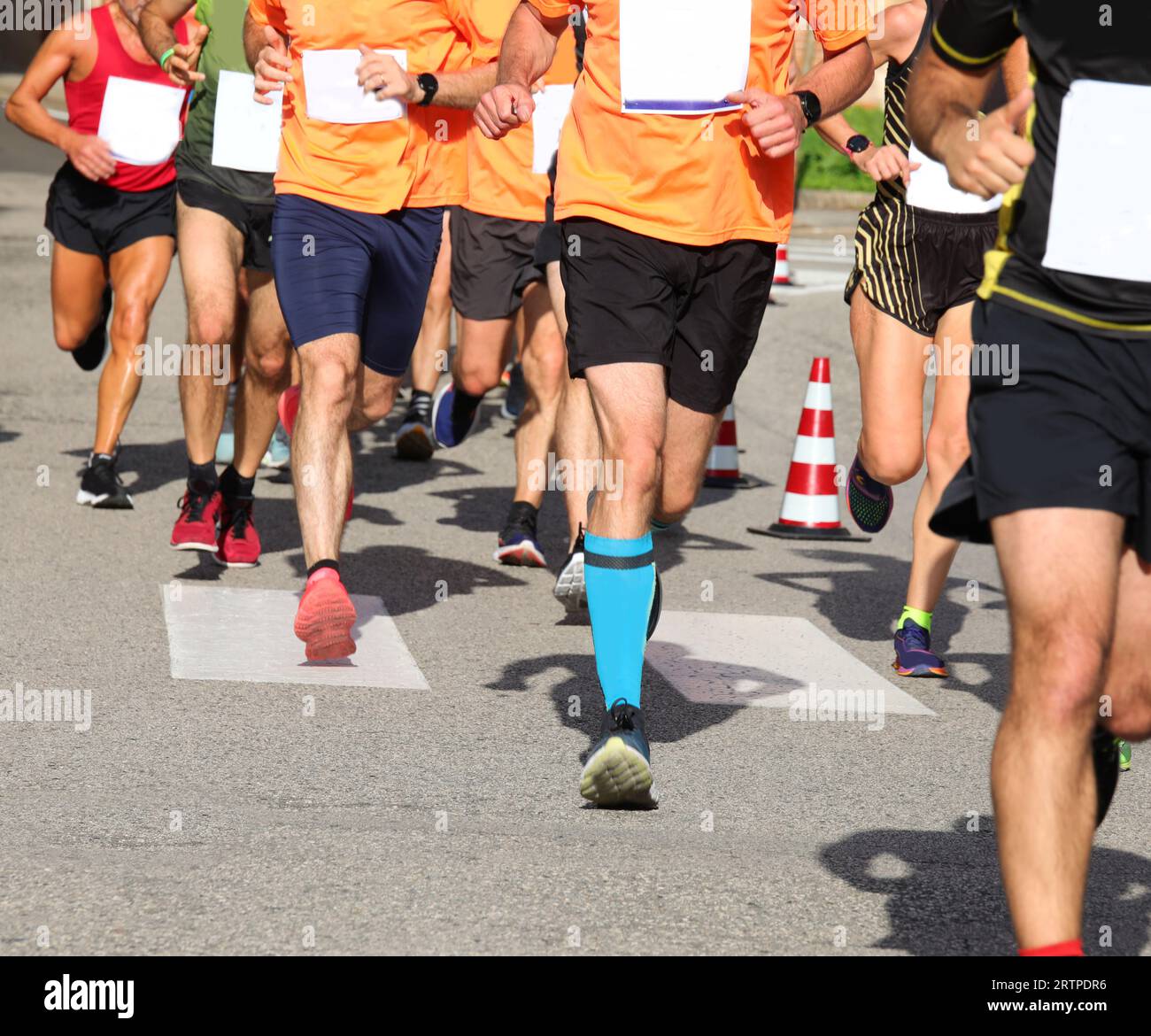 Group athletes running around hi-res stock photography and images - Alamy