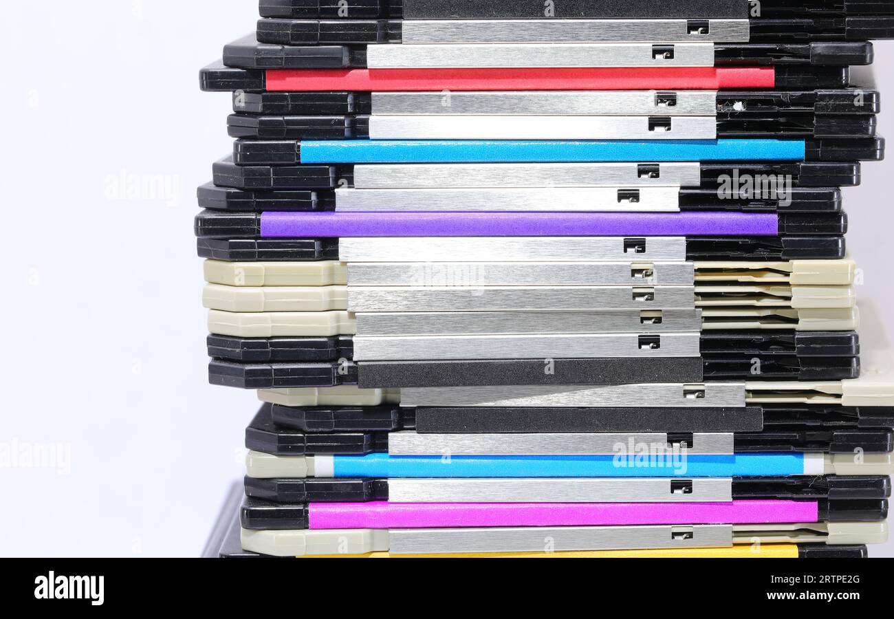 colorful old floppy disks used to save data and computer programs in ...