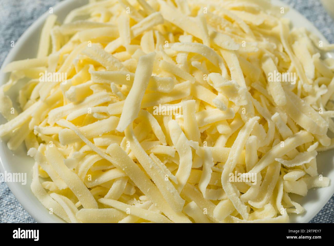Skim Shredded Mozzarella Cheese in a Bowl Stock Photo - Alamy
