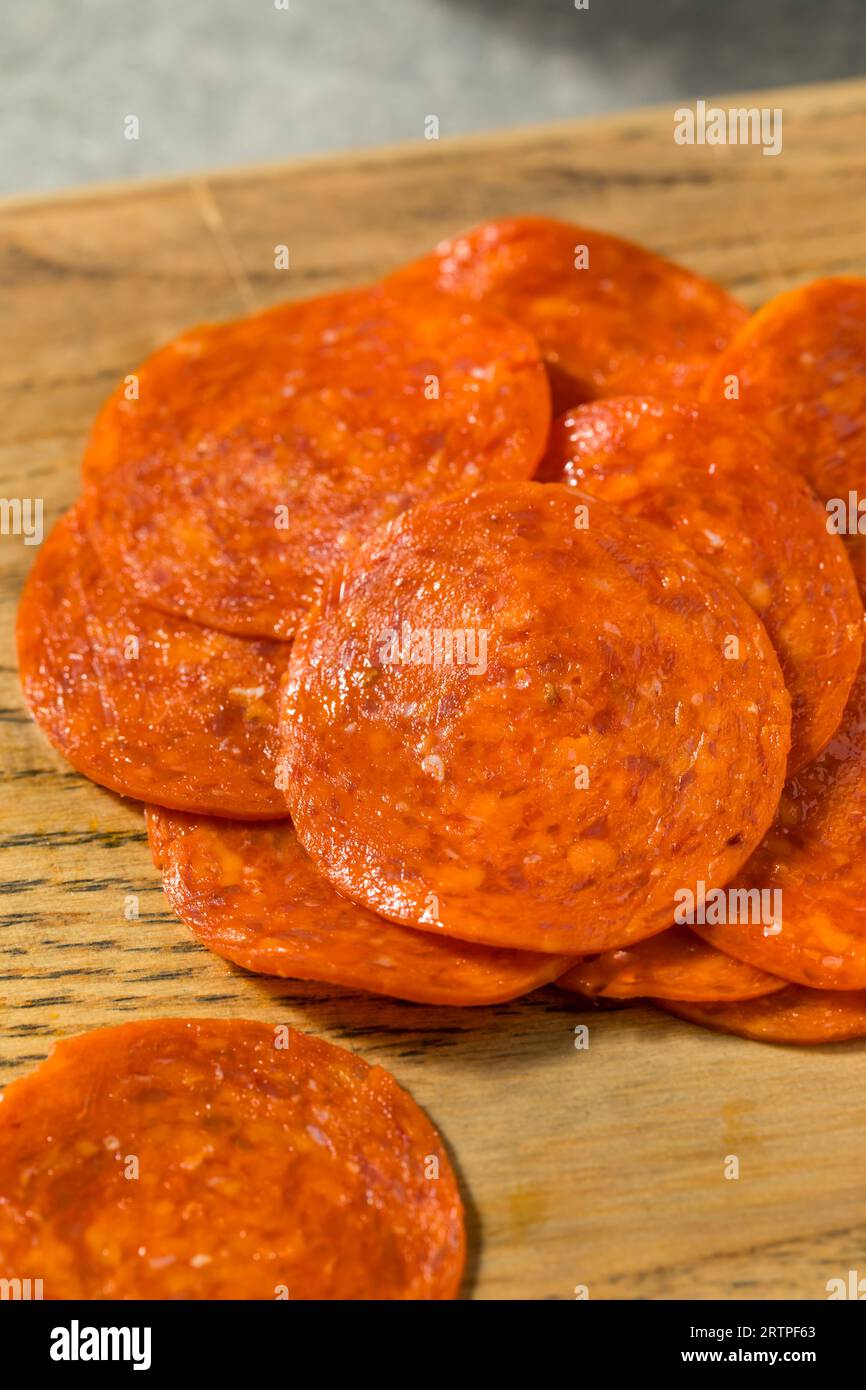 Organic Uncured Pepperoni Slices in a Pile Stock Photo - Alamy