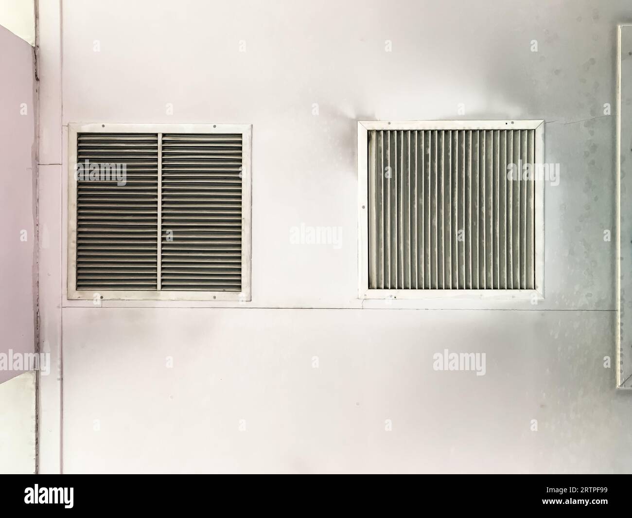 The metal grille is covering the air condition vent of the air ...