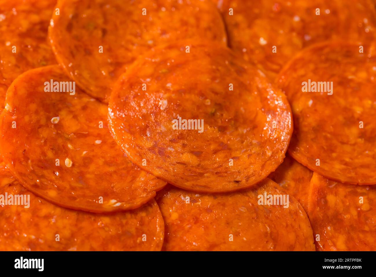 Organic Uncured Pepperoni Slices in a Pile Stock Photo - Alamy