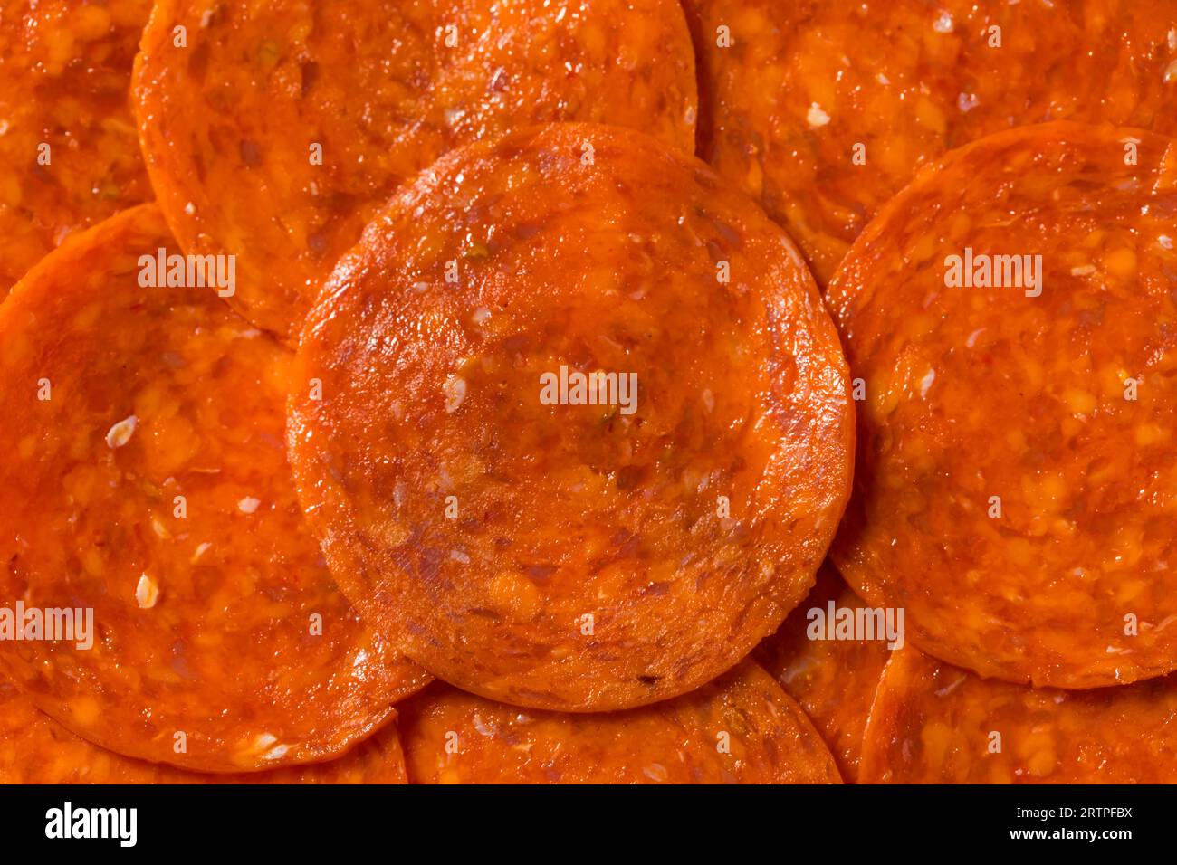 Organic Uncured Pepperoni Slices in a Pile Stock Photo - Alamy