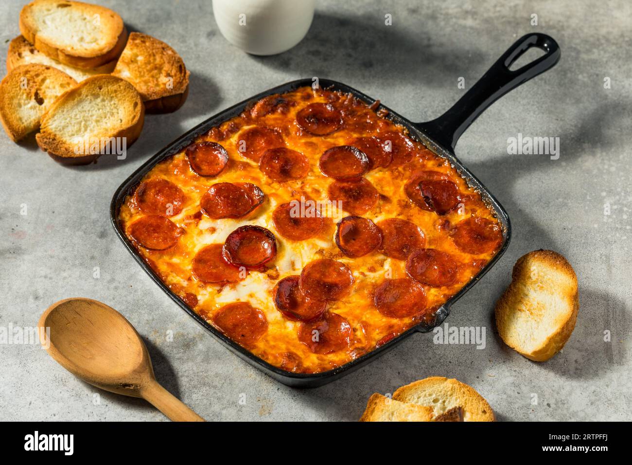 Homemade Pepperoni Pizza Appetizer Dip with Toasted Bread Stock Photo ...