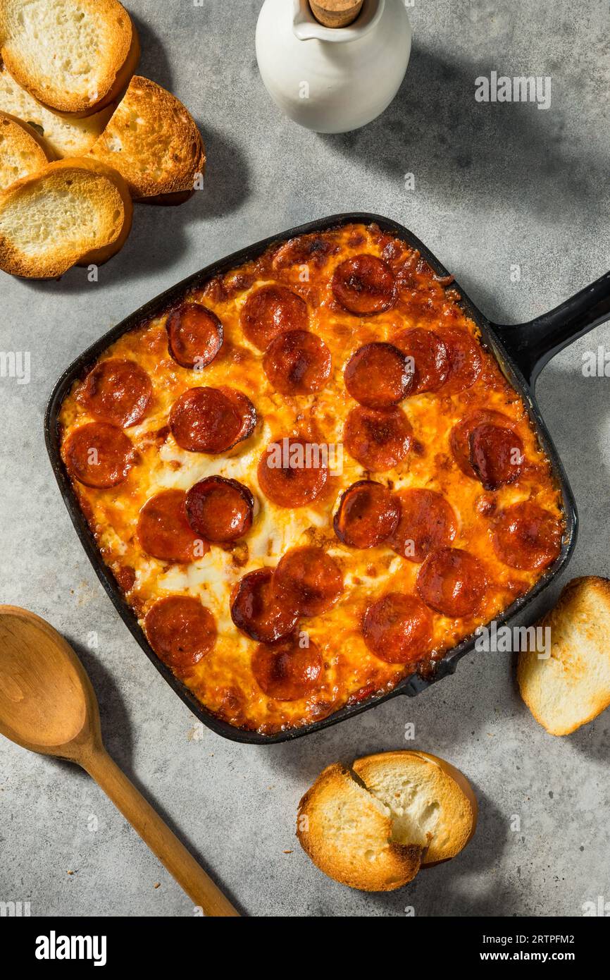Homemade Pepperoni Pizza Appetizer Dip with Toasted Bread Stock Photo ...
