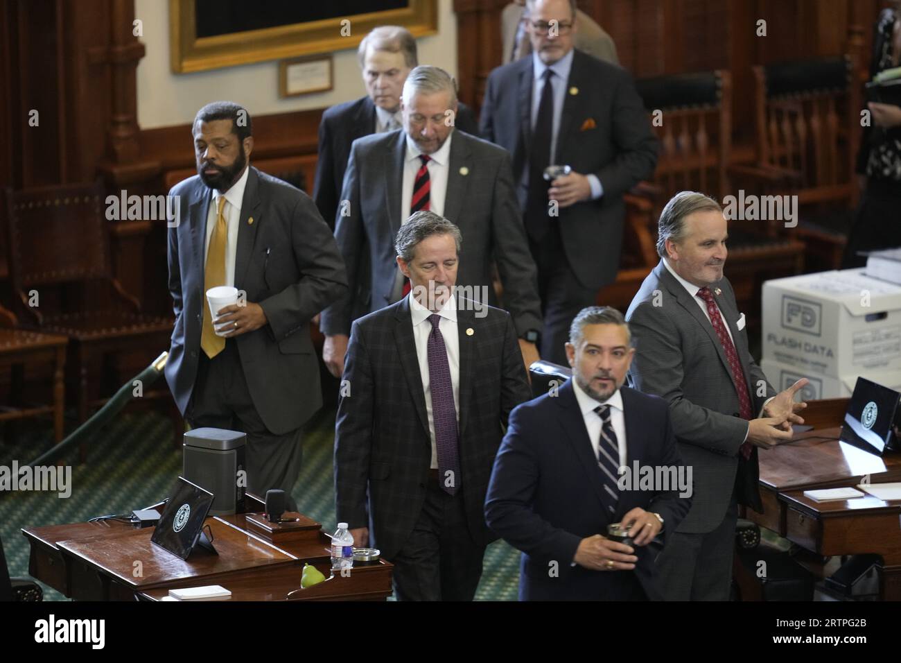 State Sen. KELLY HANCOCK and others enter the chamber during the ...