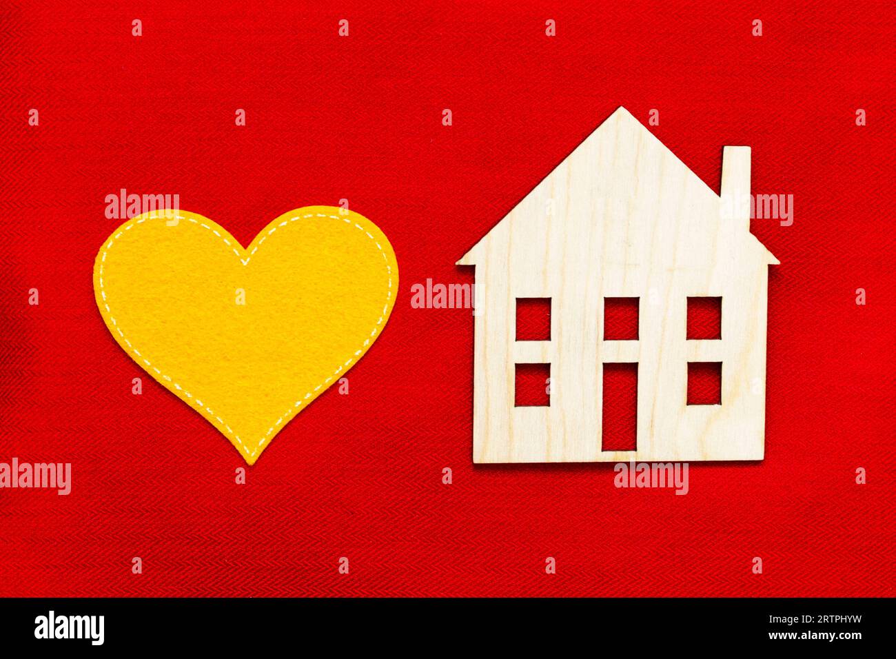 hearts and house. Symbol of love and home on a red background. Home ...