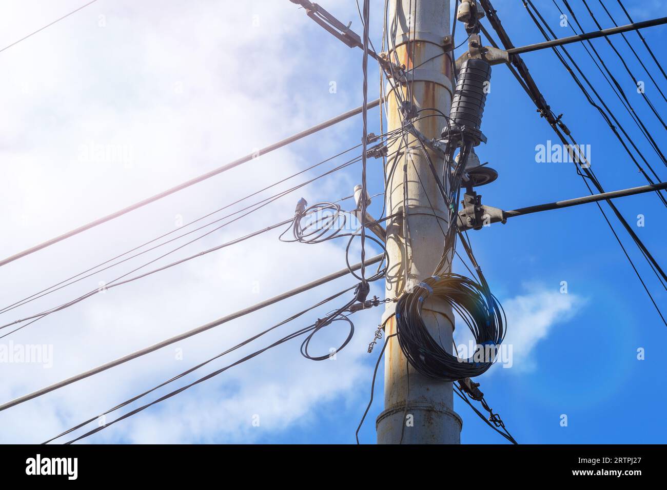 pole with wires. wires cables on Electric poles.A fiber optic cable ...