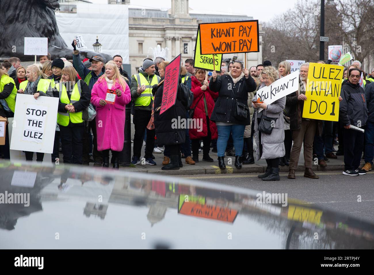 Participants gather with placards during a protest against the ...