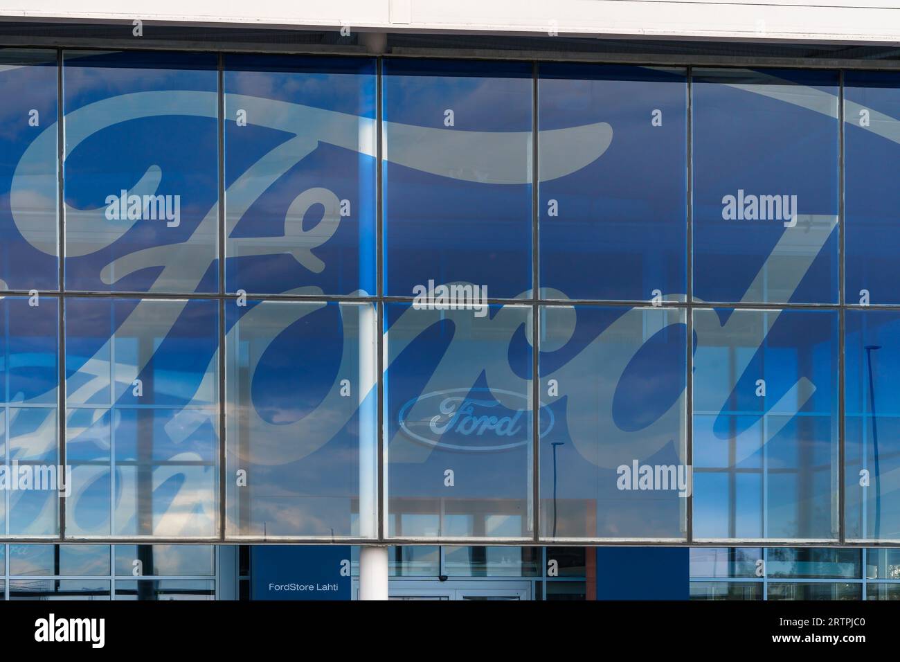Ford logo on the window of Ford Store in Lahti, Finland. July 30, 2023 ...