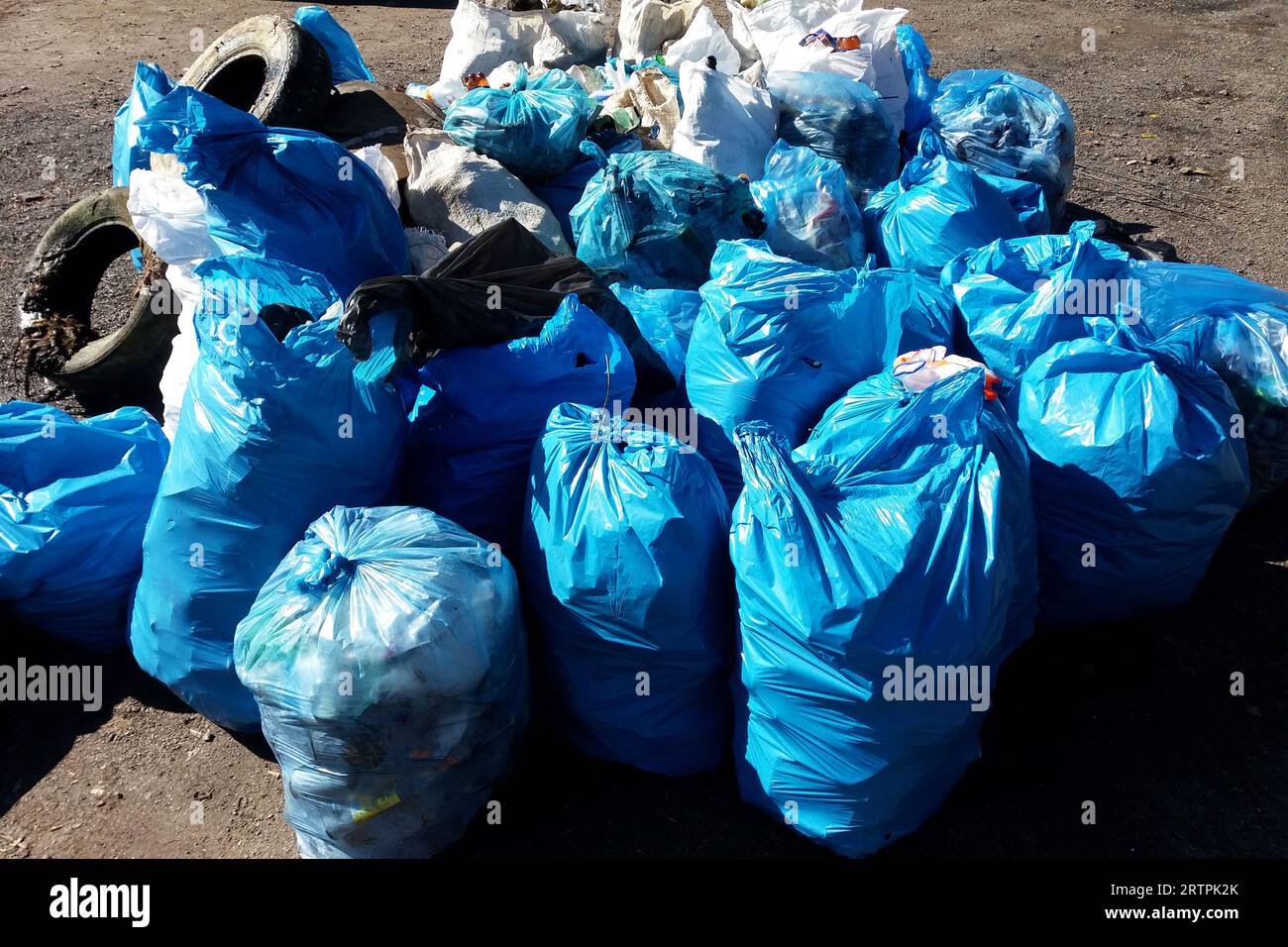 plastic bags with garbage. dump. Heap of waste. Concept environmental ...