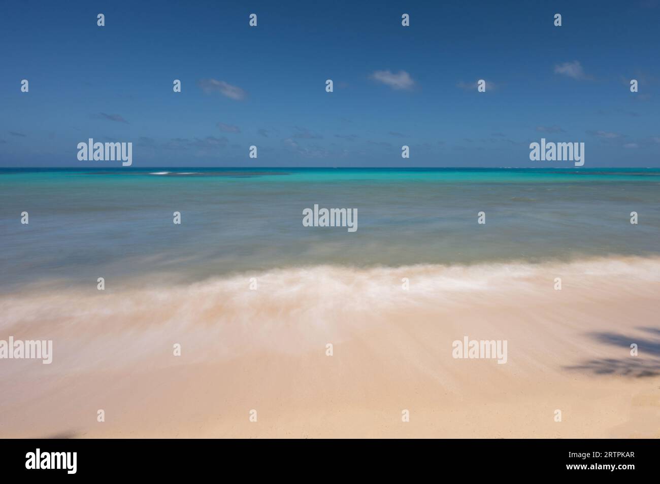 Soft smooth sea blue waves Caribbean background Stock Photo - Alamy