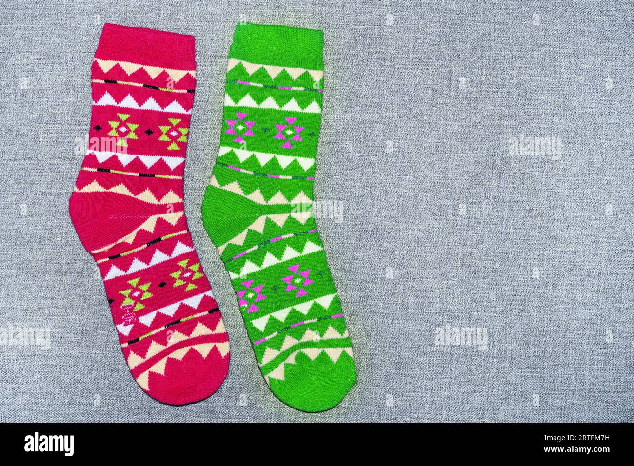 Women's legs in different beautiful socks. Colored socks on a ...