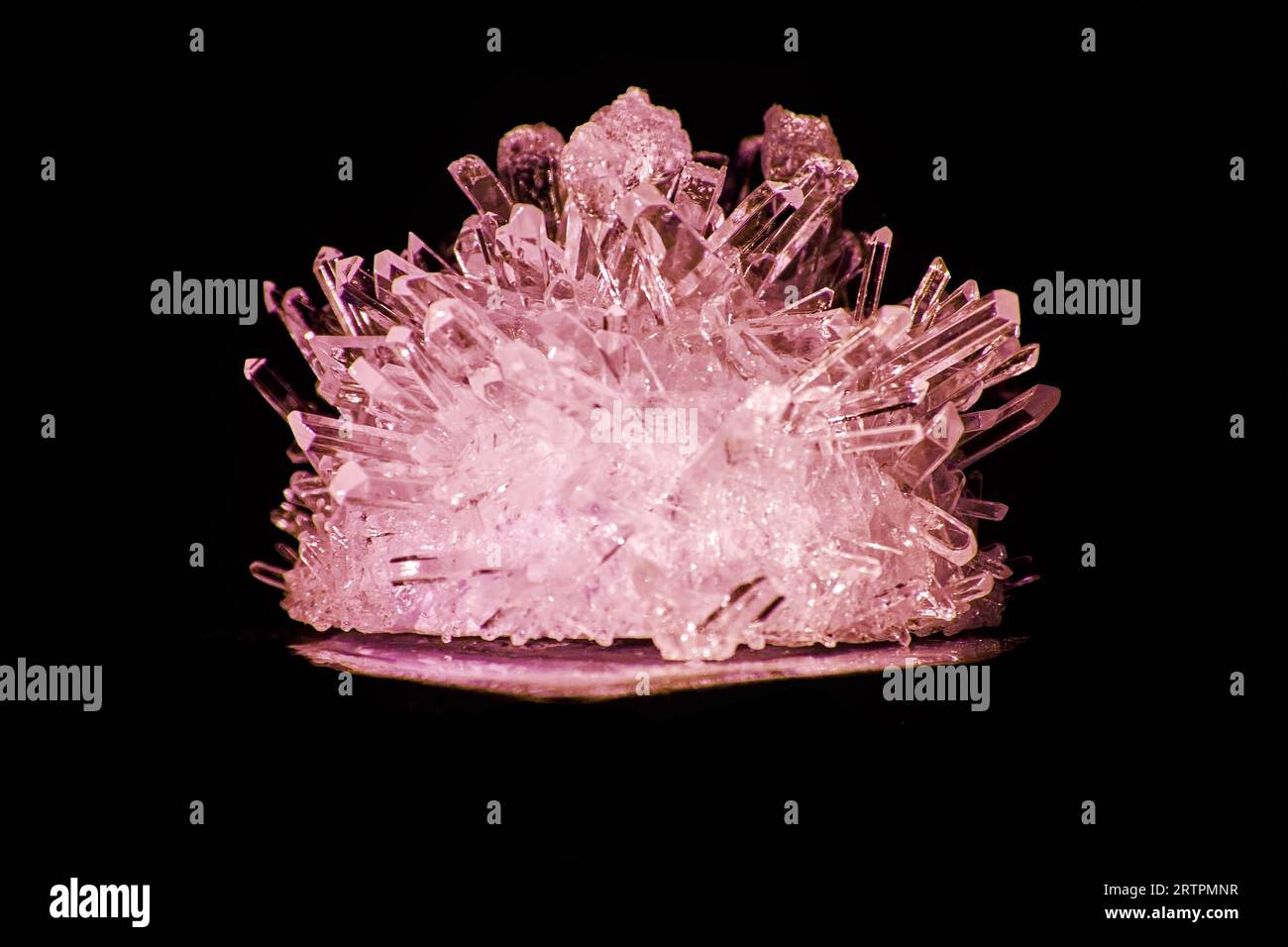 Shiny red sharp ruby crystal highlighted and isolated on black ...