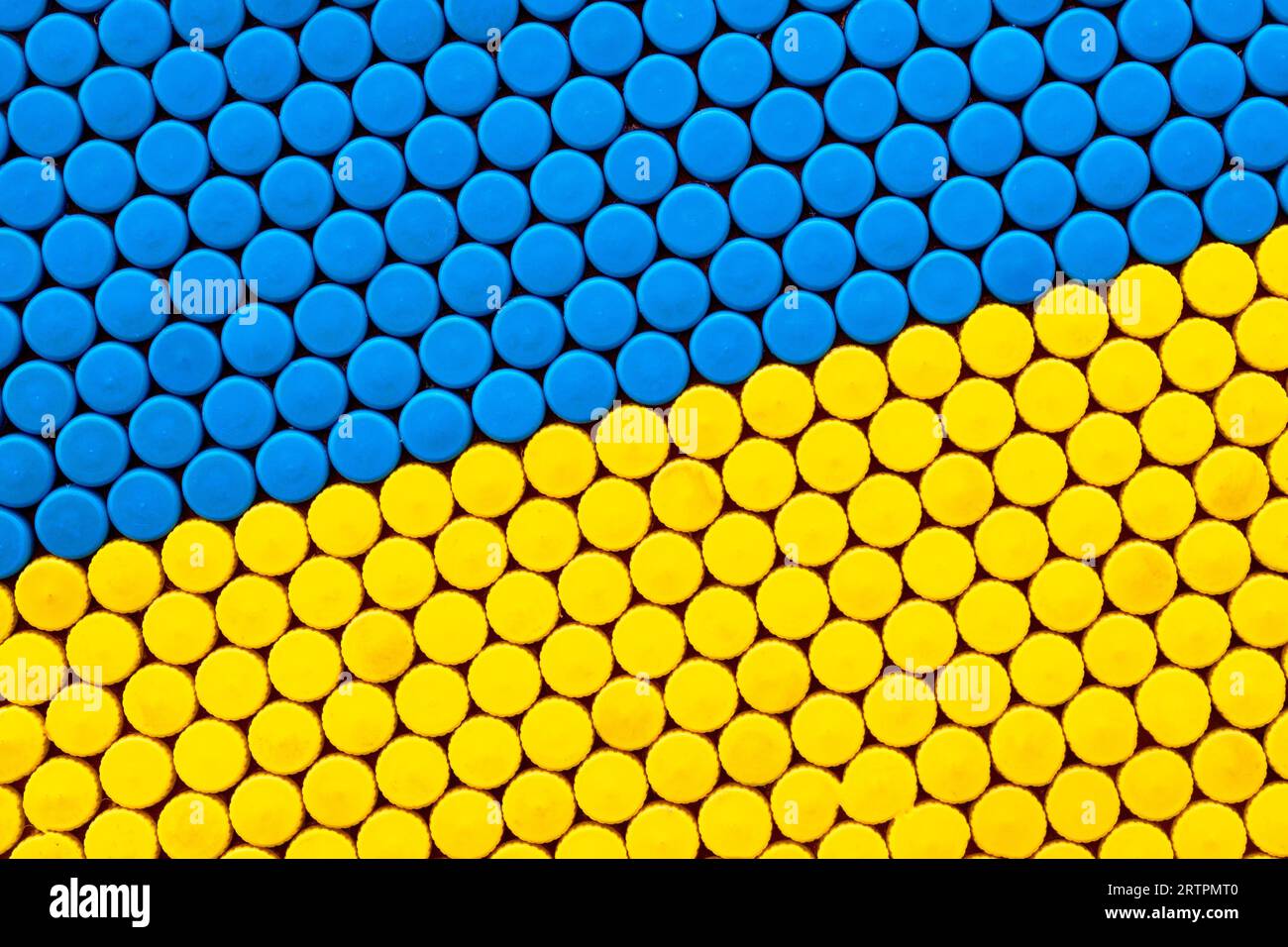 Xing yellow Texture, background from cork of plastic bottles.Blue and ...