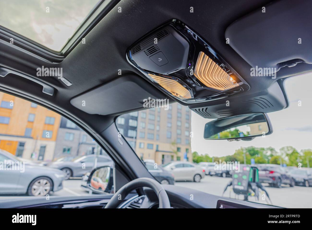 Close-up view of panoramic sunroof control panel in car with interior ...