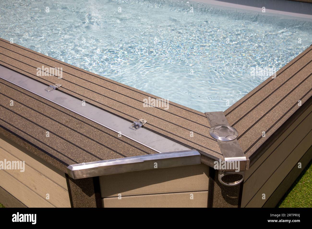 corner of a modern brown exterior private spa and full of translucent ...