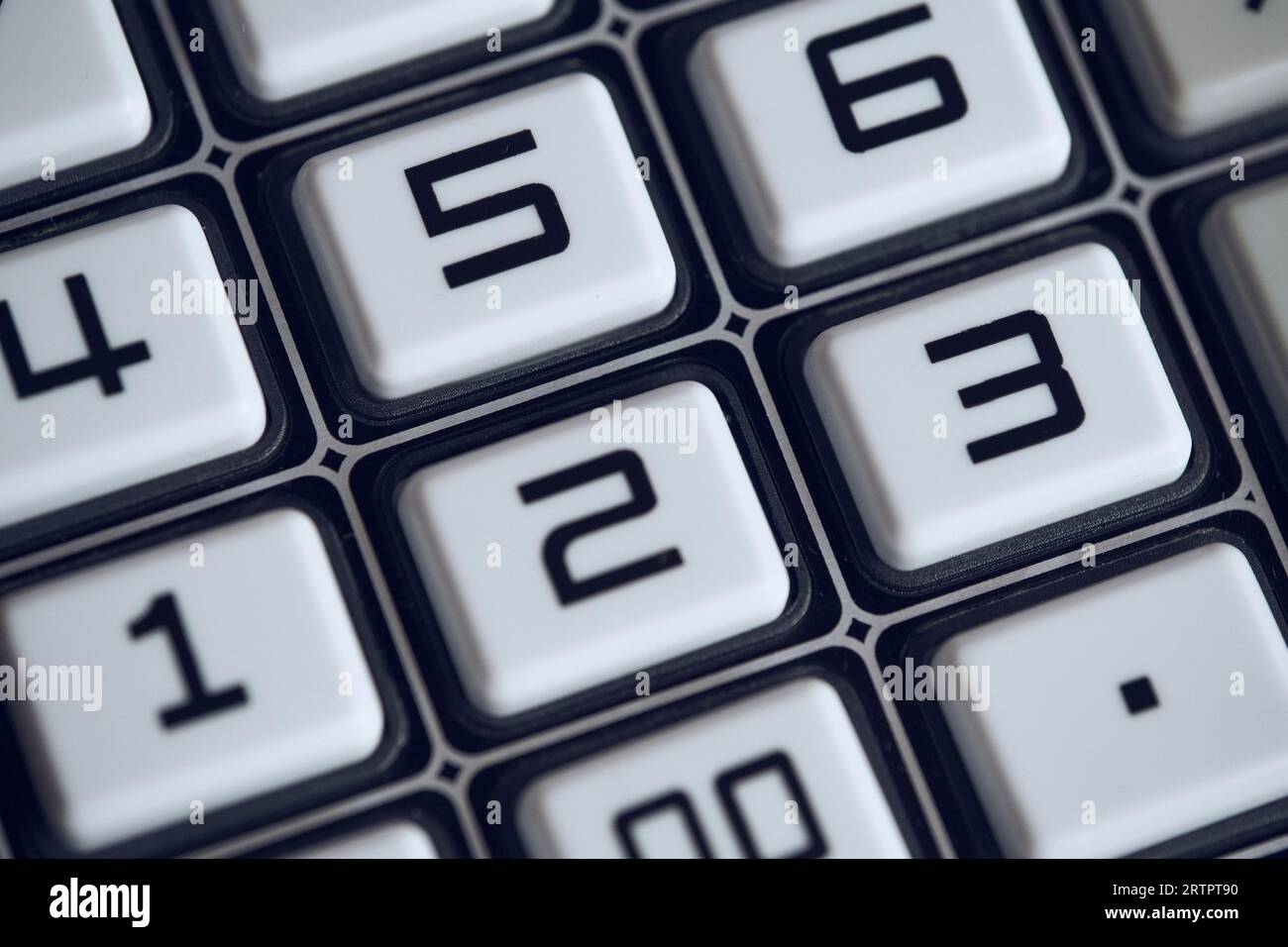 Buttons with numbers from calculator closeup Stock Photo - Alamy