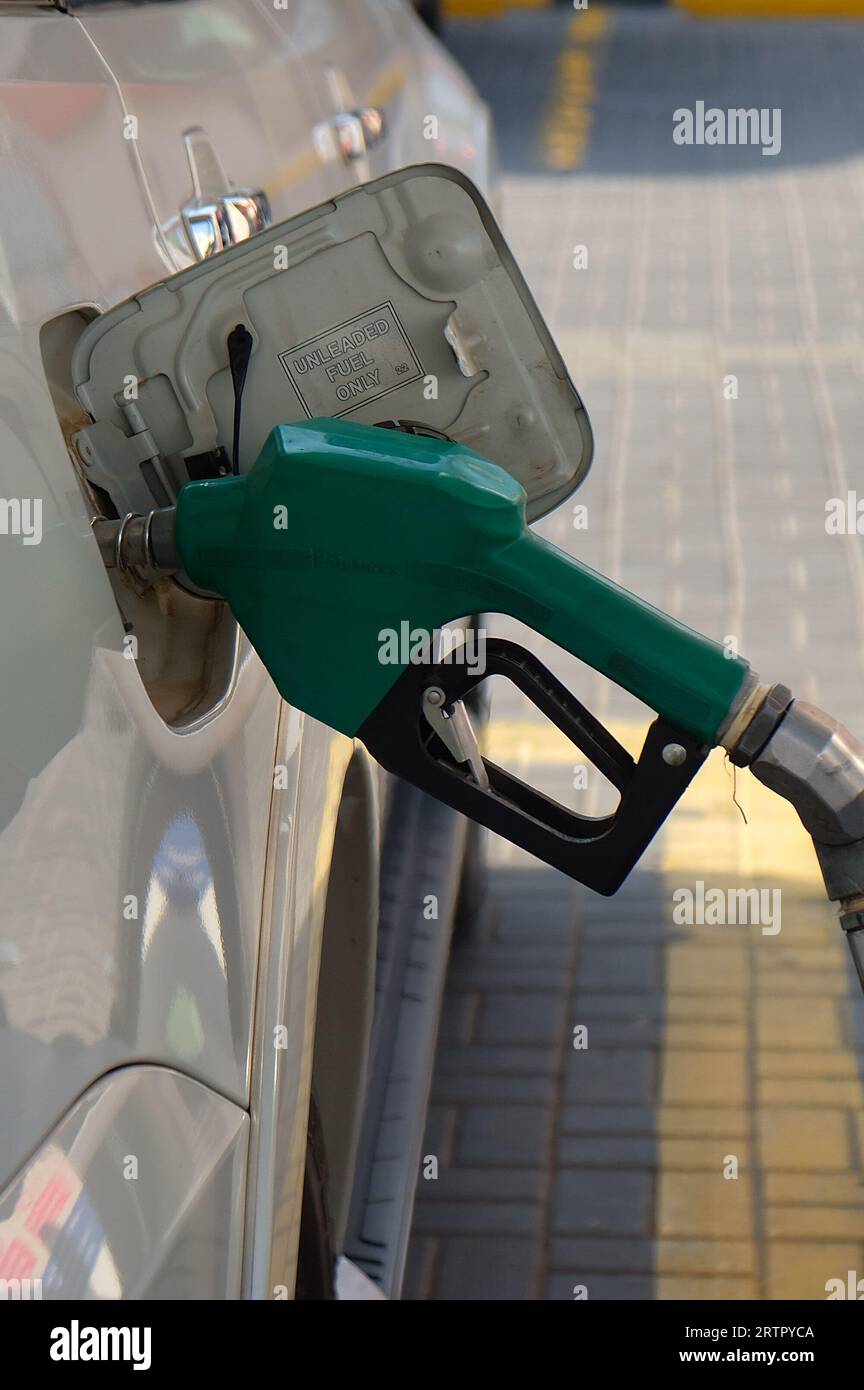 Green Fueling Nozzle Filling Benzene Fuel Stock Photo - Alamy