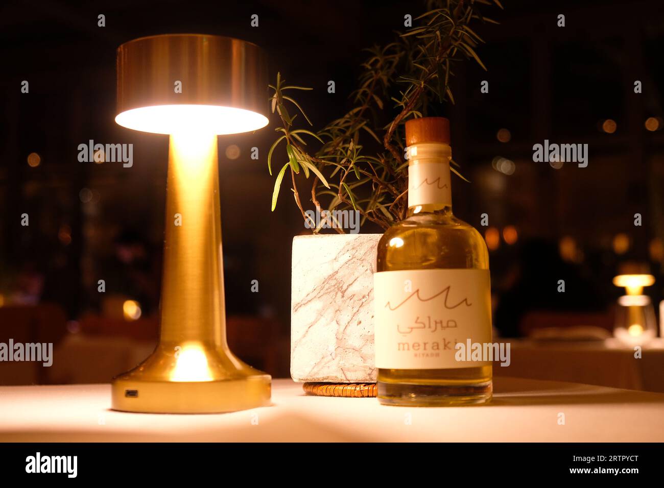 Restaurant Table at Night Stock Photo - Alamy