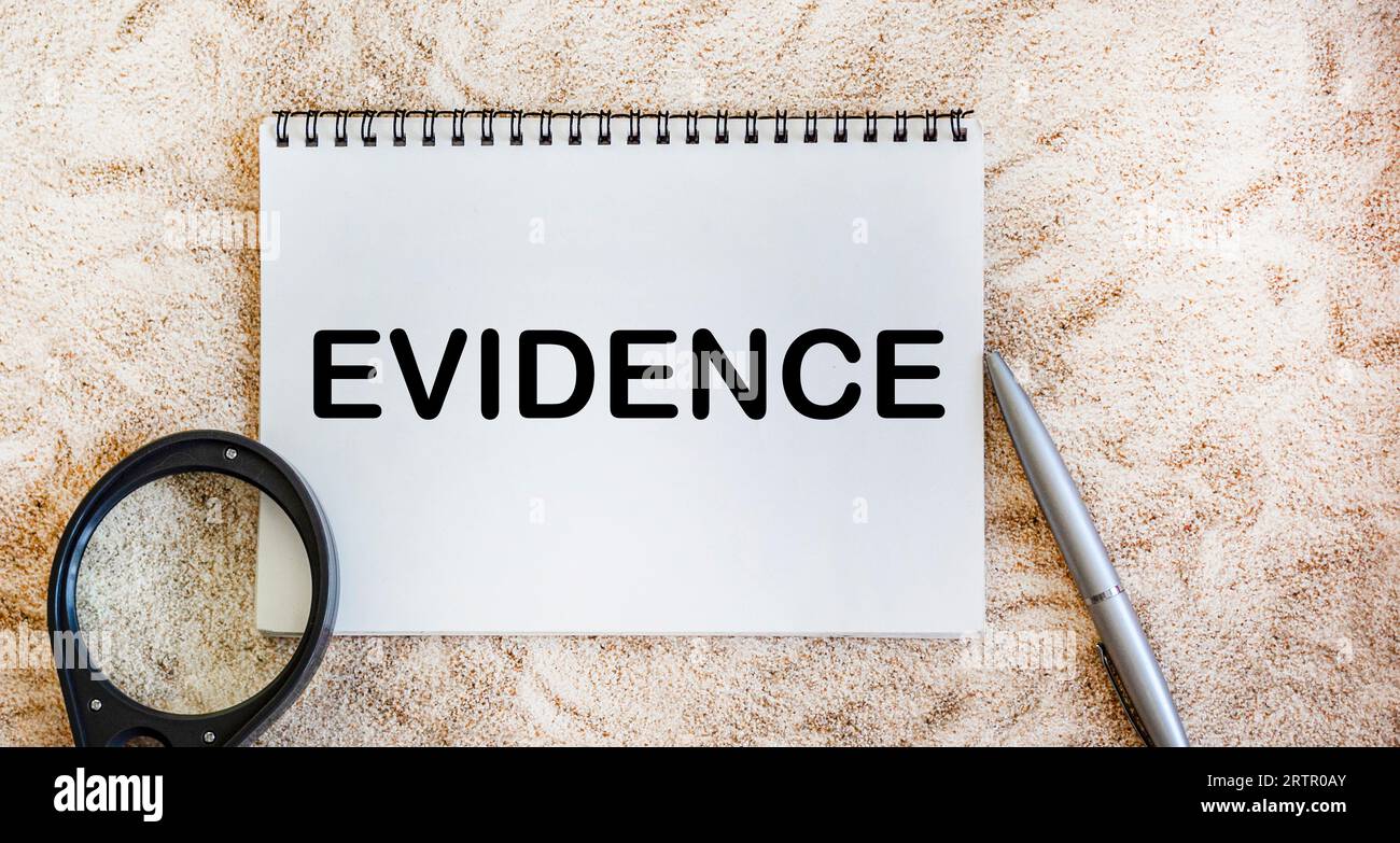 The word Evidence on a notepad and a light background. Business concept ...
