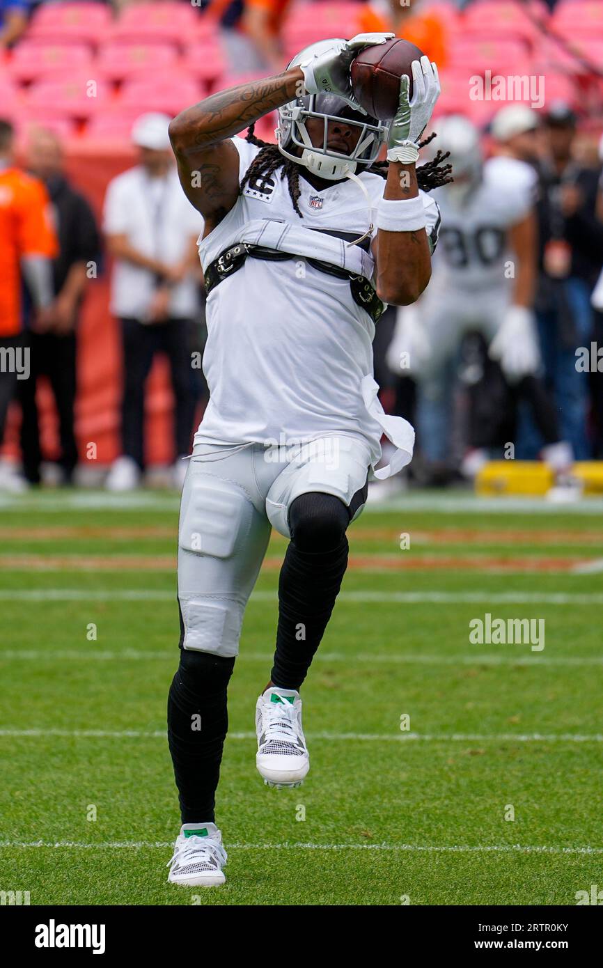 Las Vegas Raiders wide receiver Davante Adams warms up during an NFL ...