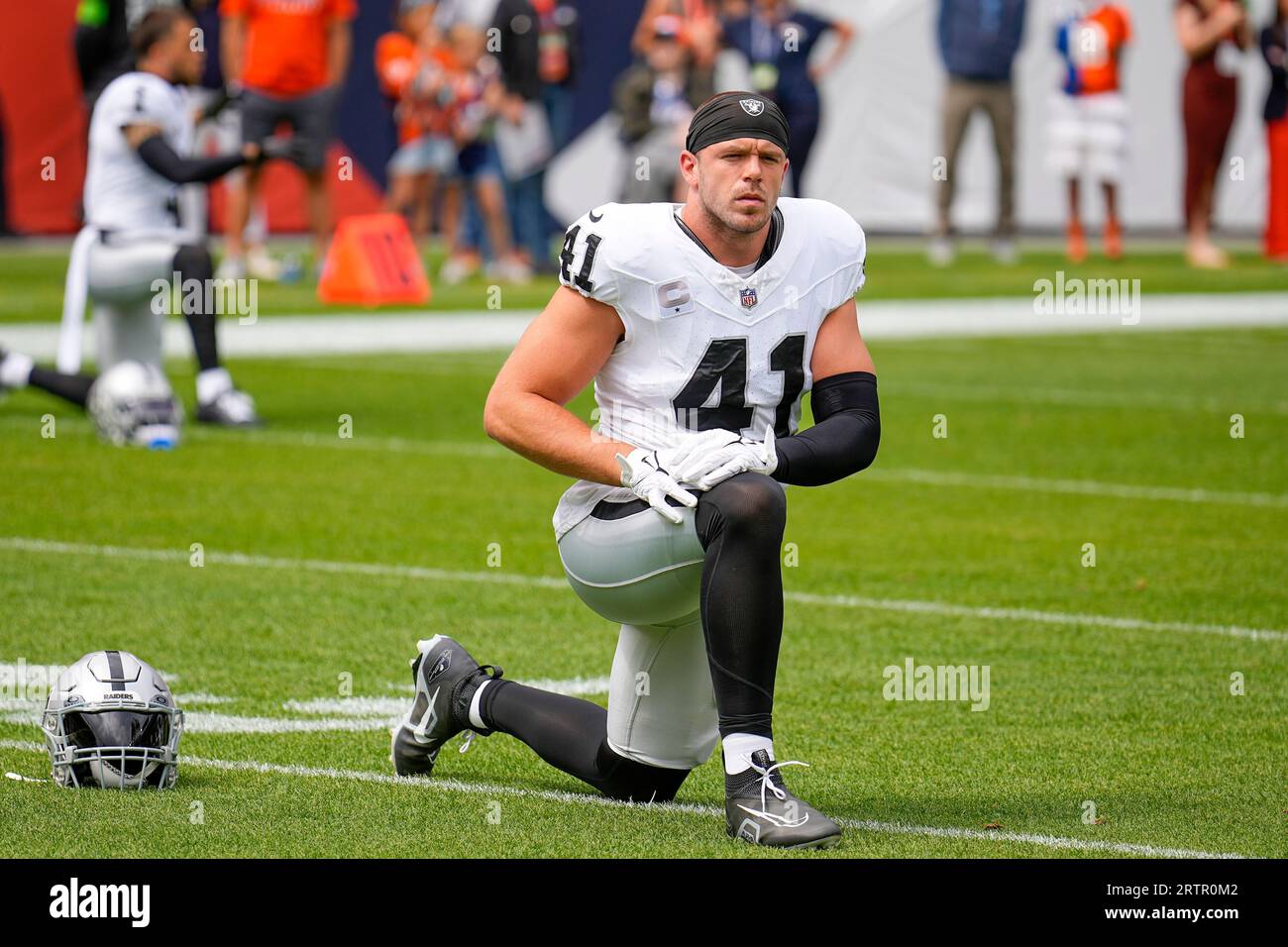 Las Vegas Raiders linebacker Robert Spillane stretches before an NFL ...