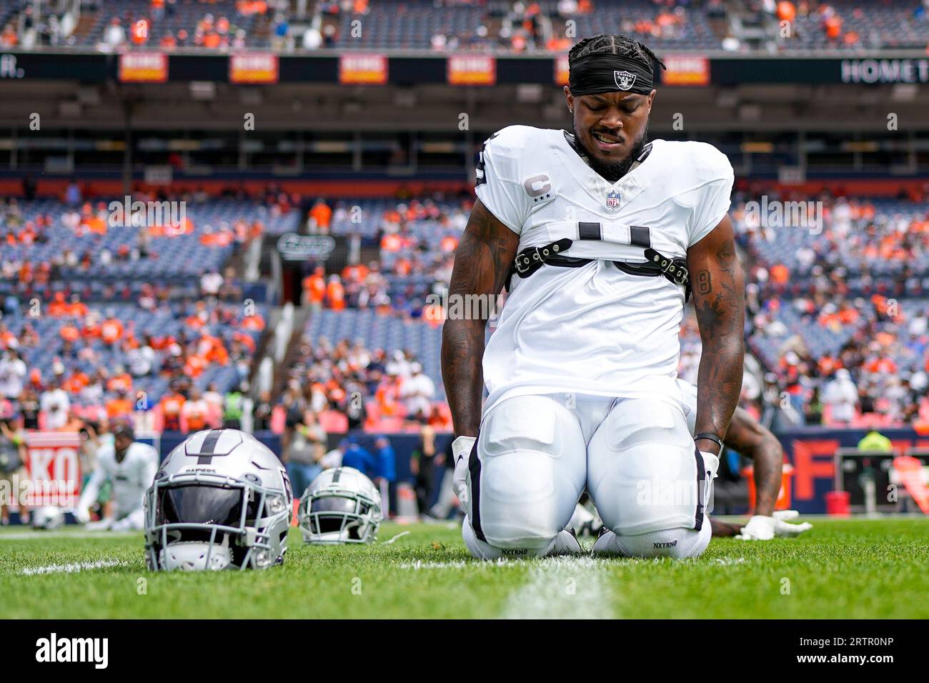 Las Vegas Raiders running back Josh Jacobs stretches before an NFL ...