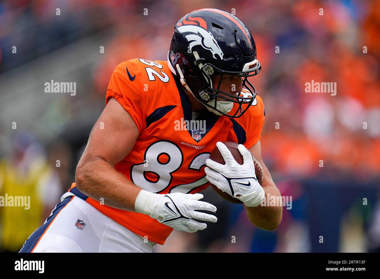 Denver Broncos tight end Adam Trautman (82) runs against the Las Vegas ...