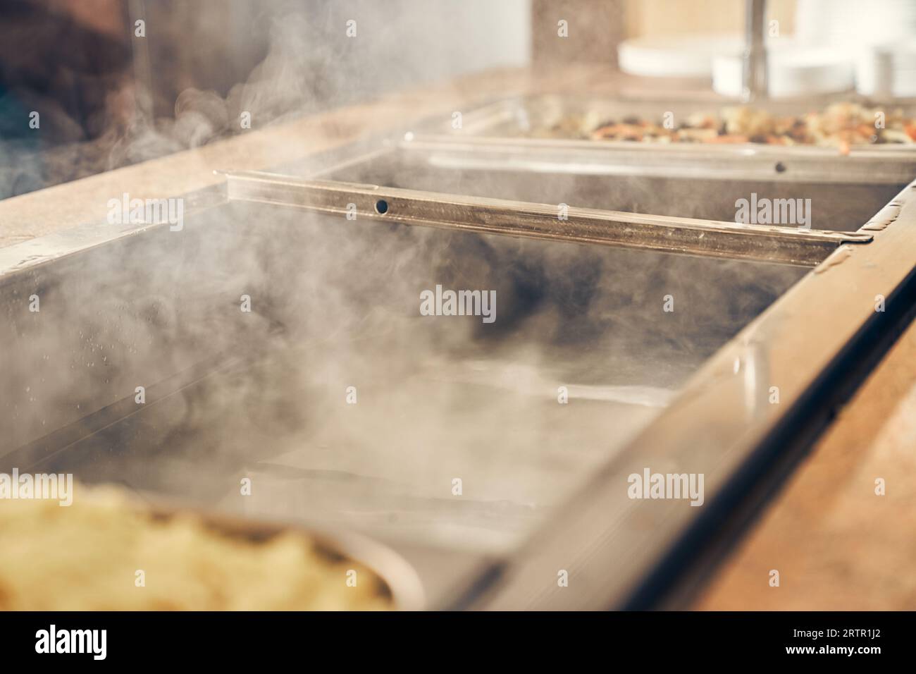 Empty container. Steam comes out to warm up the food. Distribution of ...