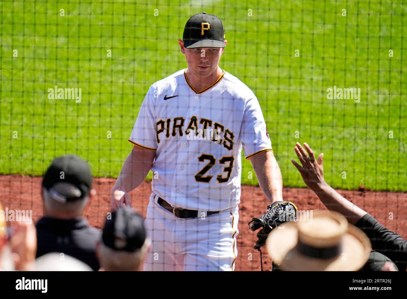 Pittsburgh Pirates starting pitcher Mitch Keller returns to the dugout ...