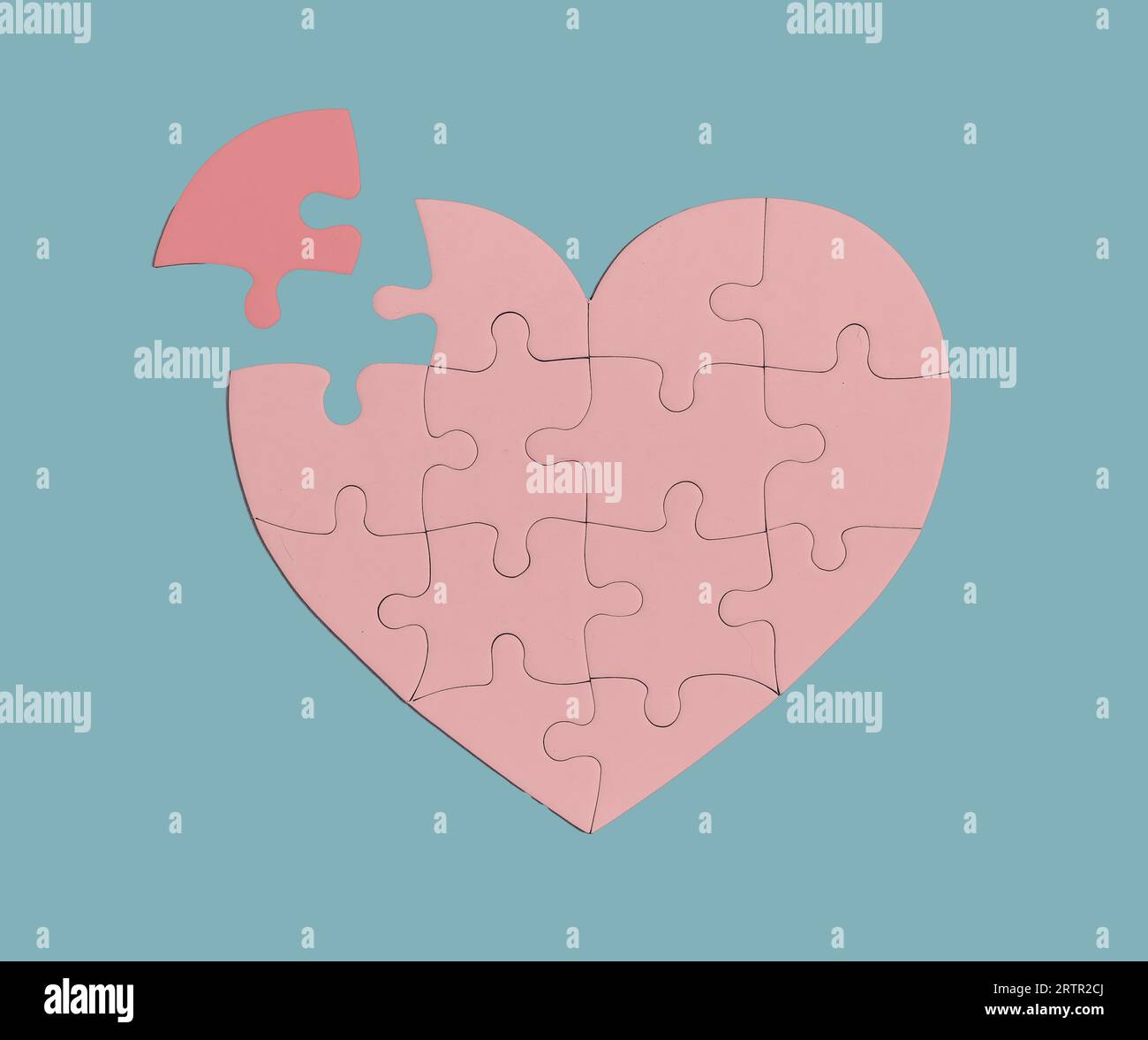 Breaking cracking heart puzzle Stock Photo - Alamy