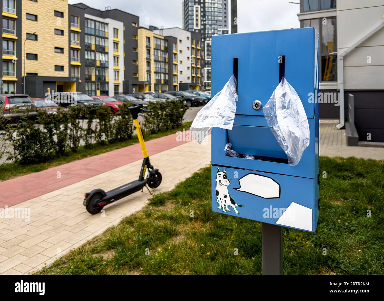 Eco city concept with e scooter and pets poop bags dispenser Stock ...