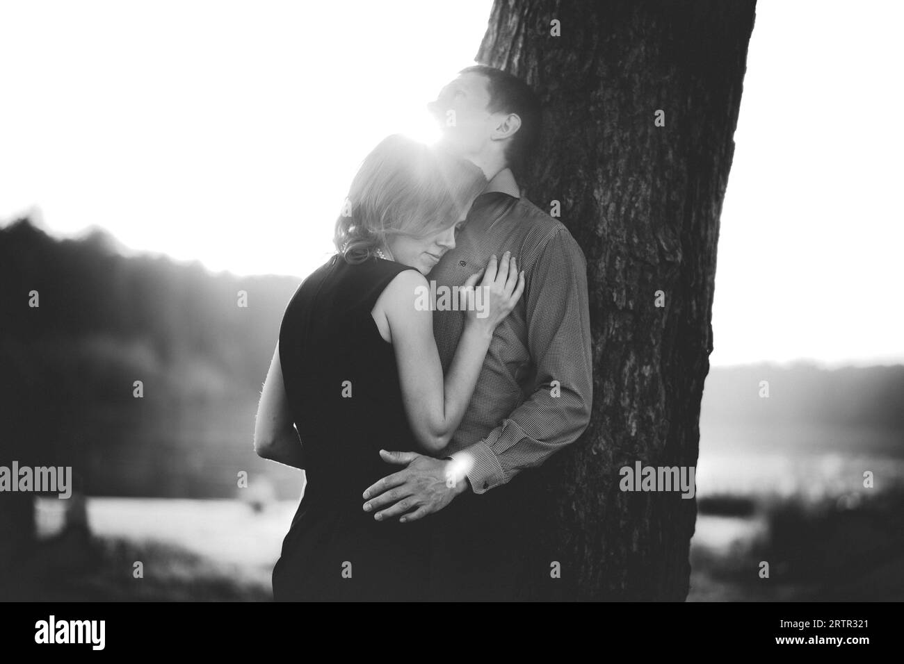 Beautiful Young Couple Walking In The Park A Romantic Walk Of Man And