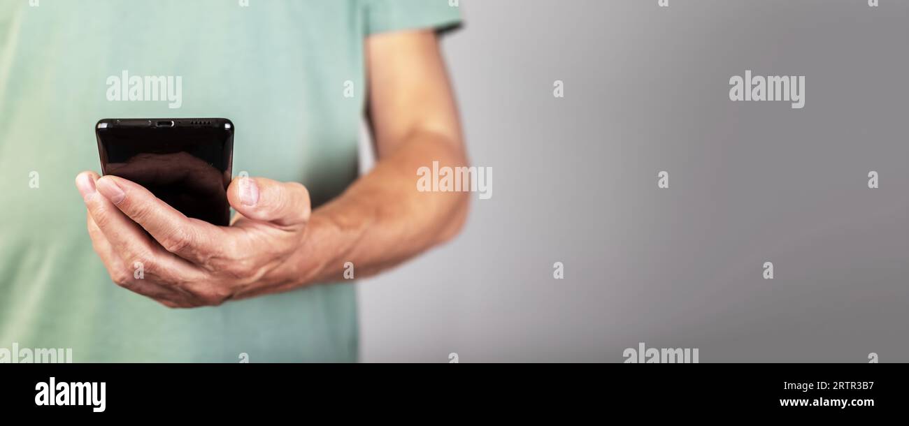 Hand holding mobile phone, smartphone, banner background Stock Photo ...