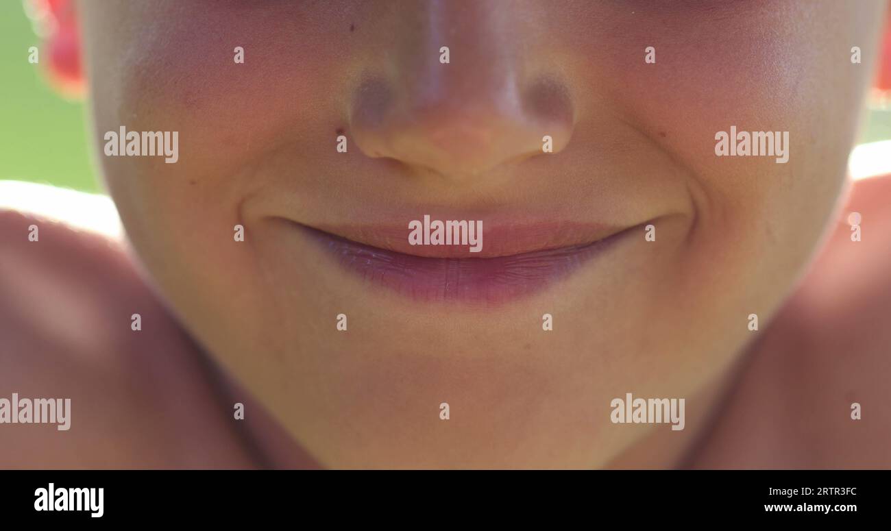 Child lips close-up changing emotions, kid changes mood from happy to ...