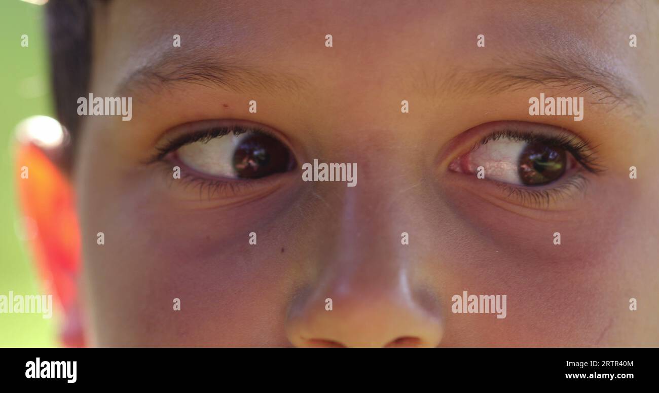 Child eyes looking sideways right and left feeling anxious. Worried ...